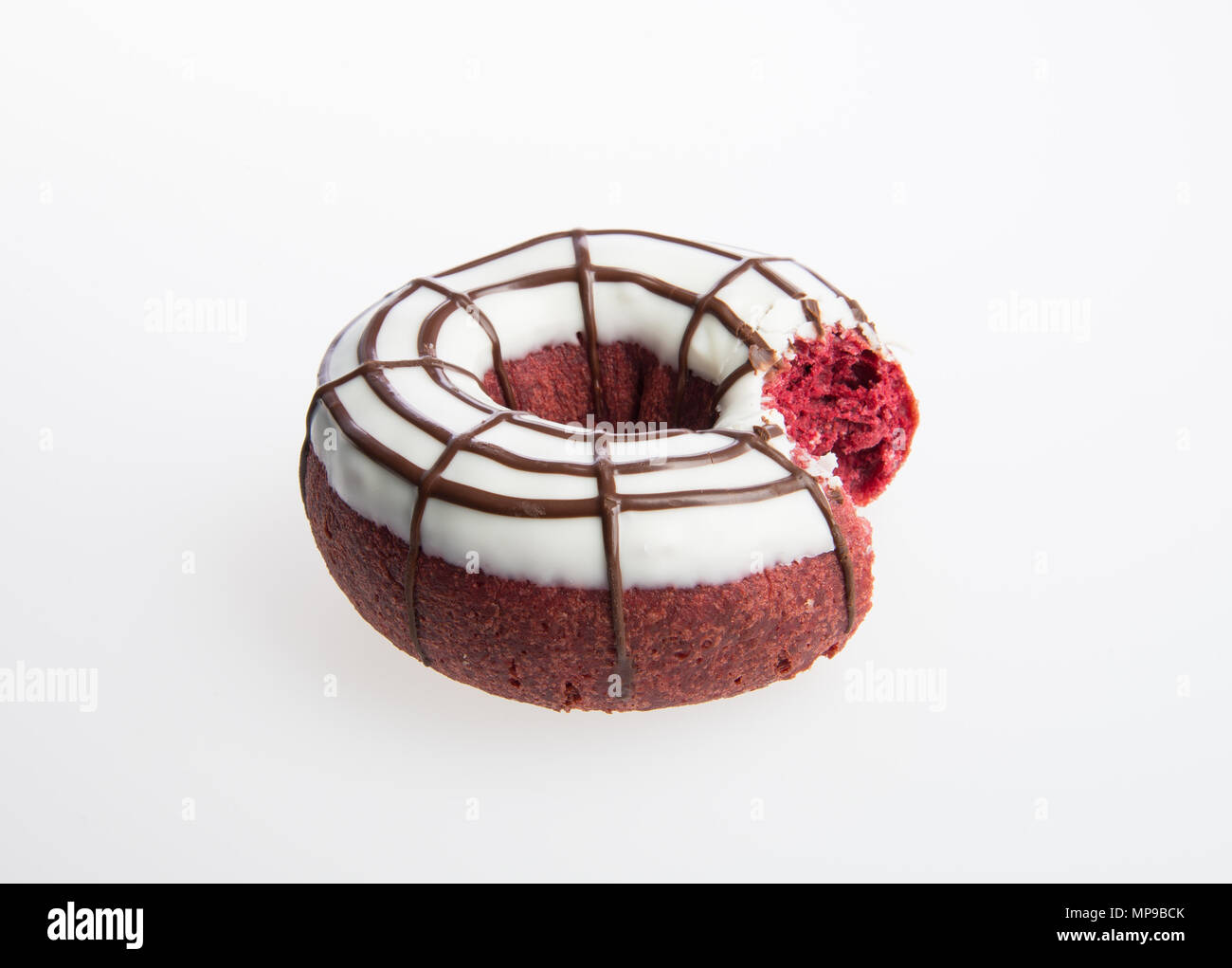 donut or donut with missing bite on a background Stock Photo - Alamy
