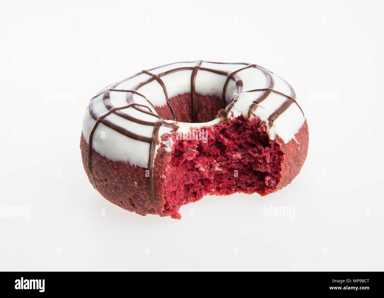 donut or donut with missing bite on a background Stock Photo - Alamy