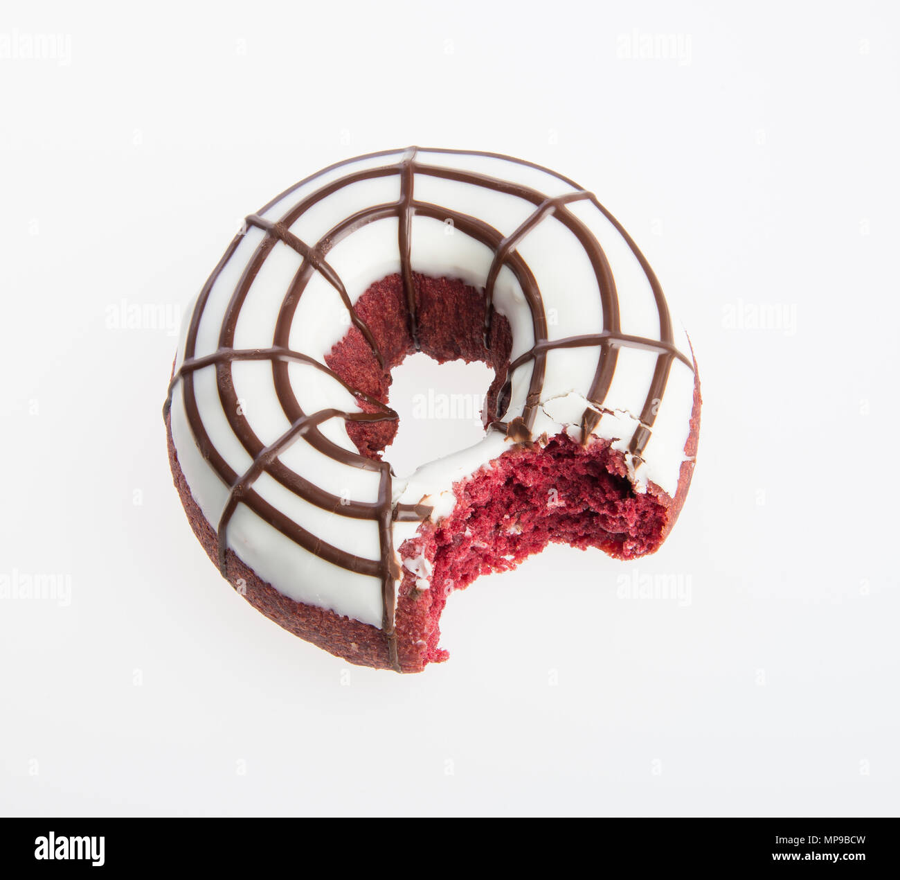 donut or donut with missing bite on a background Stock Photo - Alamy