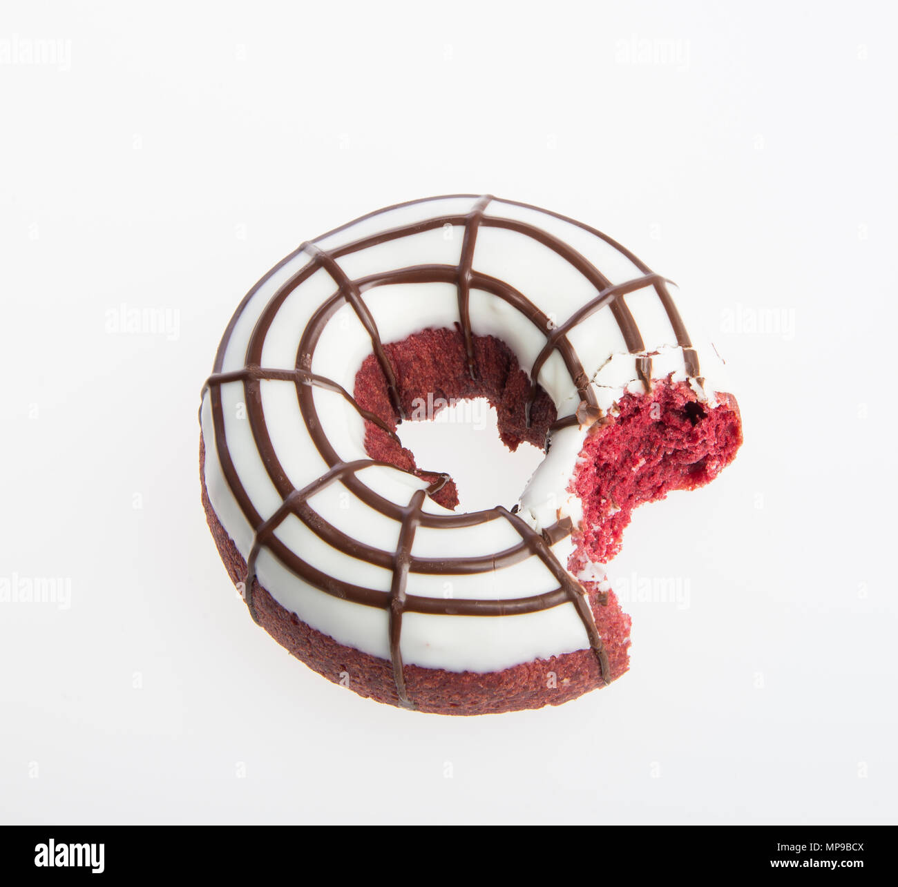 donut or donut with missing bite on a background Stock Photo - Alamy