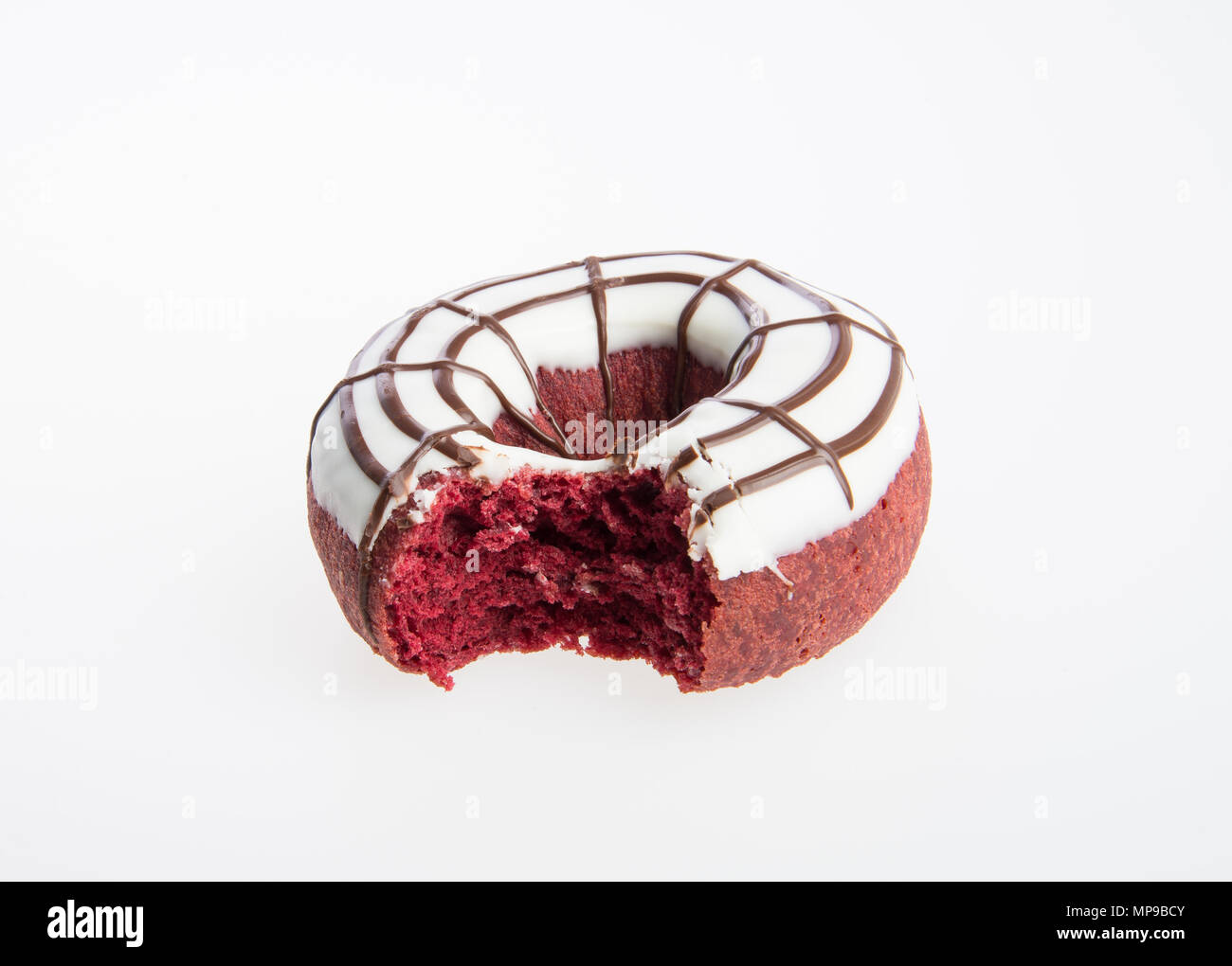 donut or donut with missing bite on a background Stock Photo - Alamy