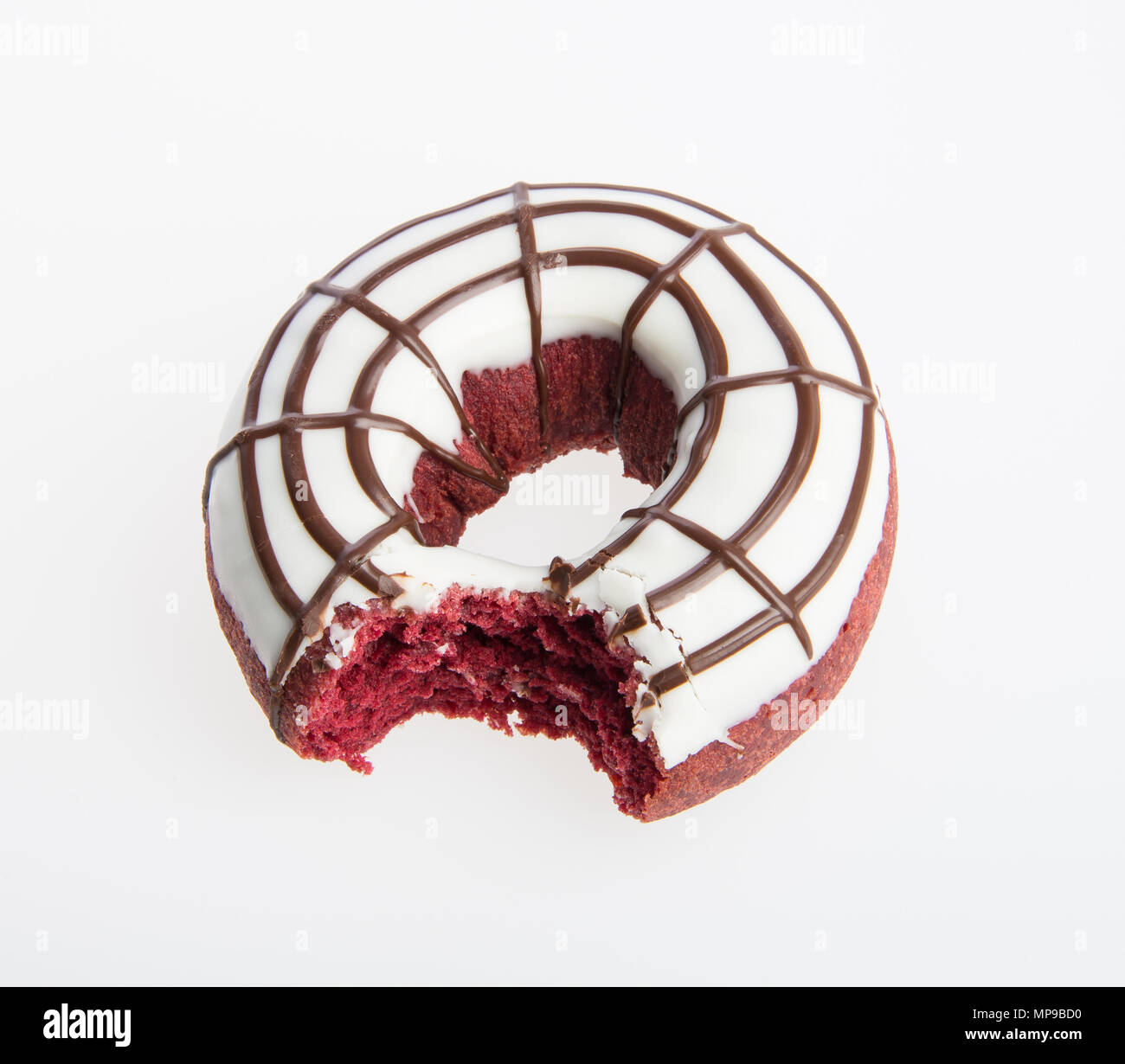 donut or donut with missing bite on a background Stock Photo - Alamy