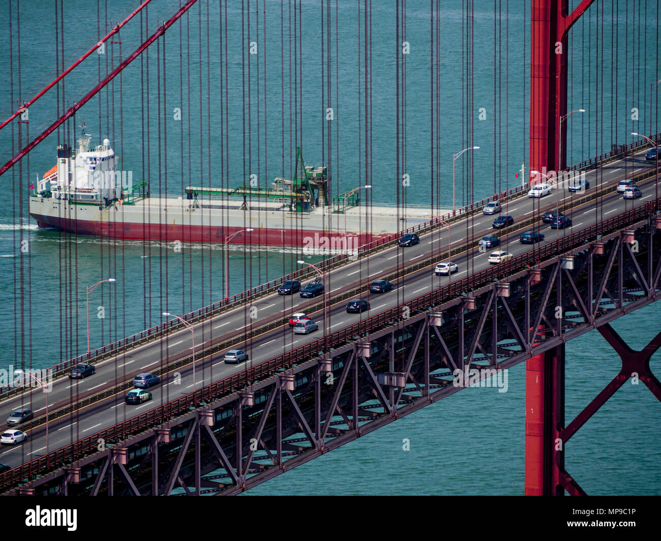 Big ship sails under bridge hi-res stock photography and images - Alamy