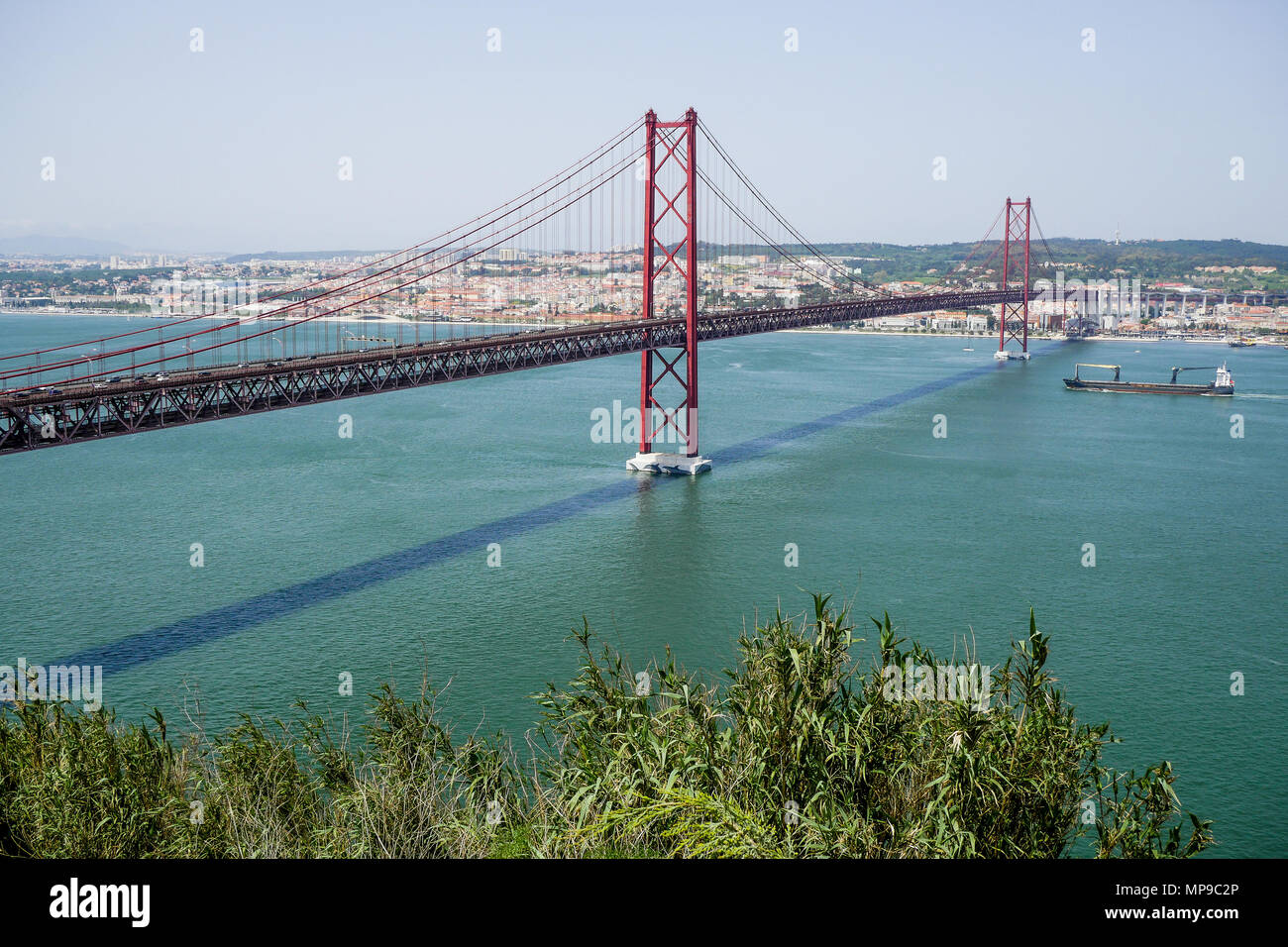 April 25 Bridge crosses Tagus river, Lisbon, Portugal Stock Photo - Alamy
