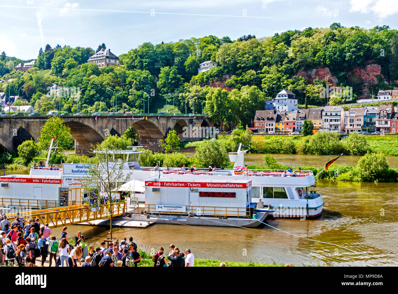 TRIER, GERMANY-MAY 15, 2018: Ship mooring in front of the oldest bridge ...
