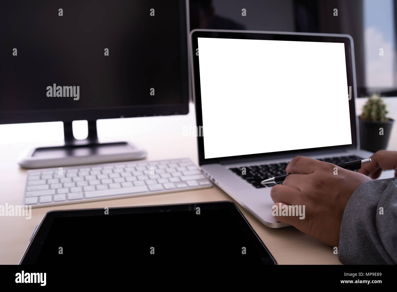 Laptop with blank screen on table. Workspace background new project on ...