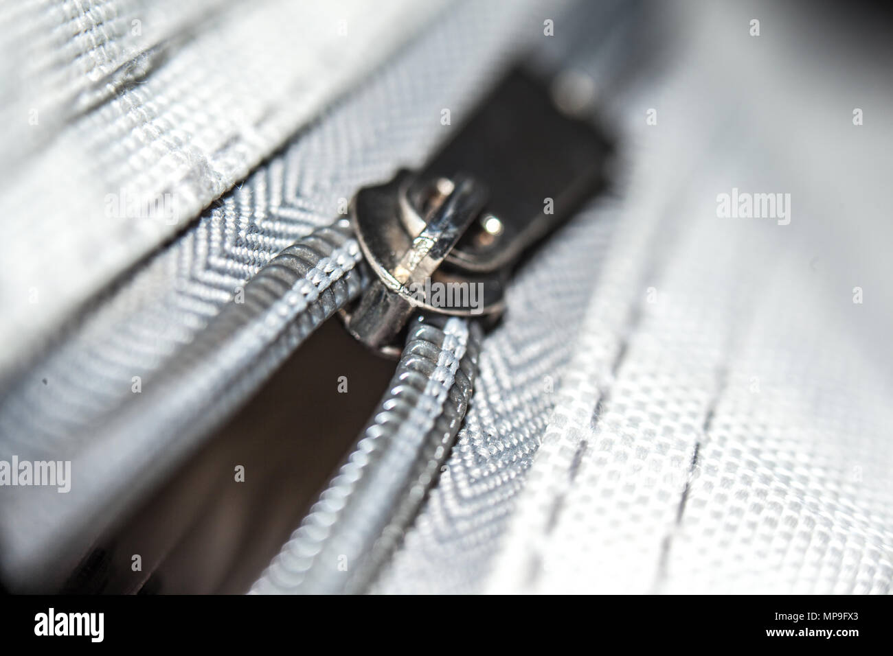 Opening of the zip locker hi-res stock photography and images - Alamy