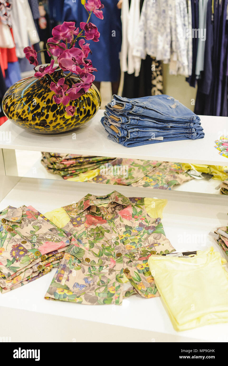 summer outfits in a women's clothing store in a shopping center Stock ...