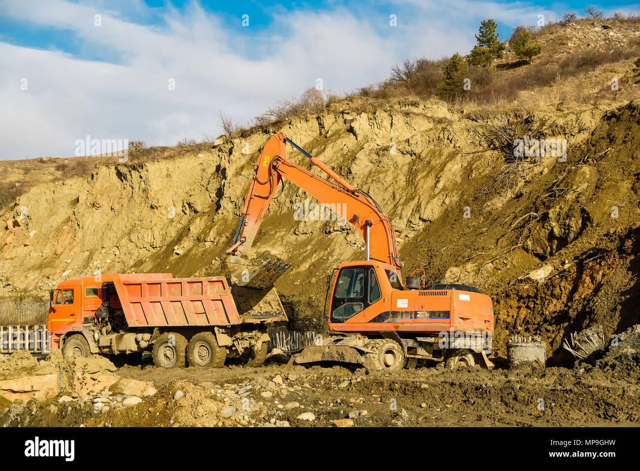 Road works with excavator in the country in fall Stock Photo - Alamy