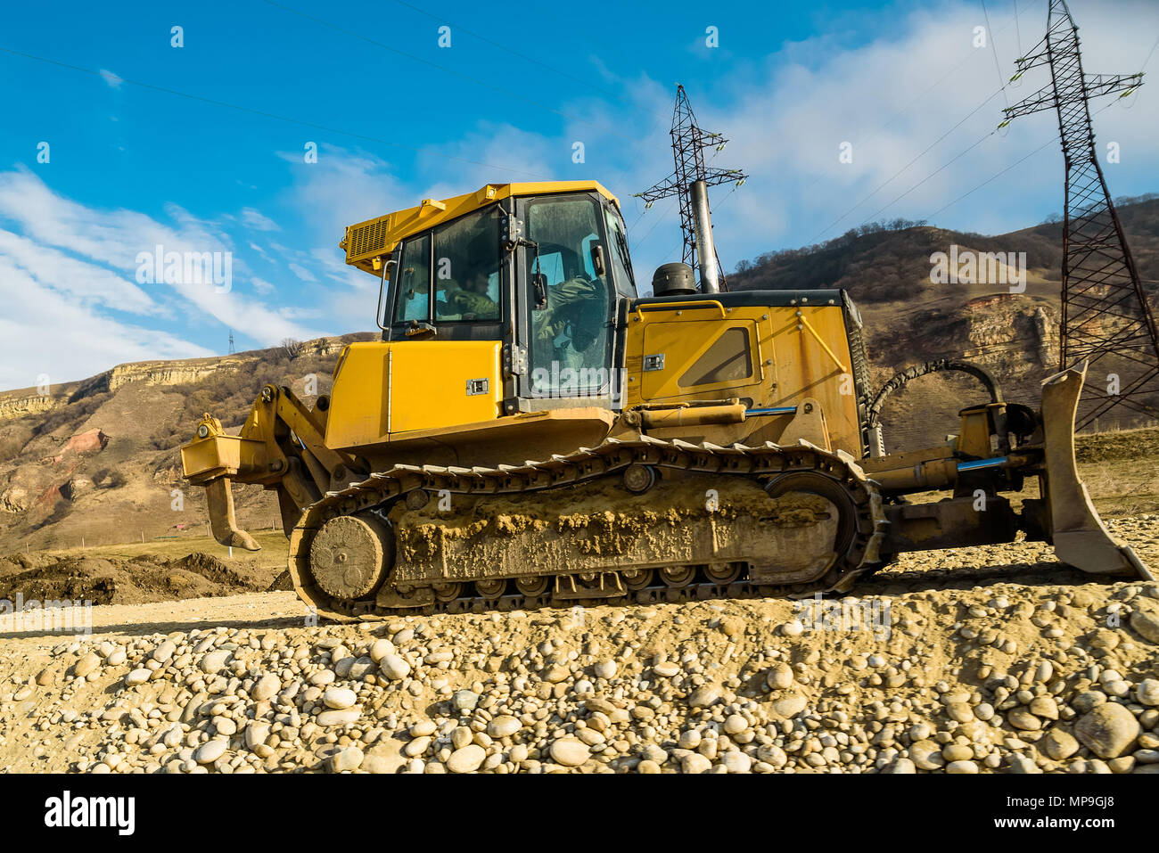 Road works with bulldozer in the country in fall Stock Photo - Alamy