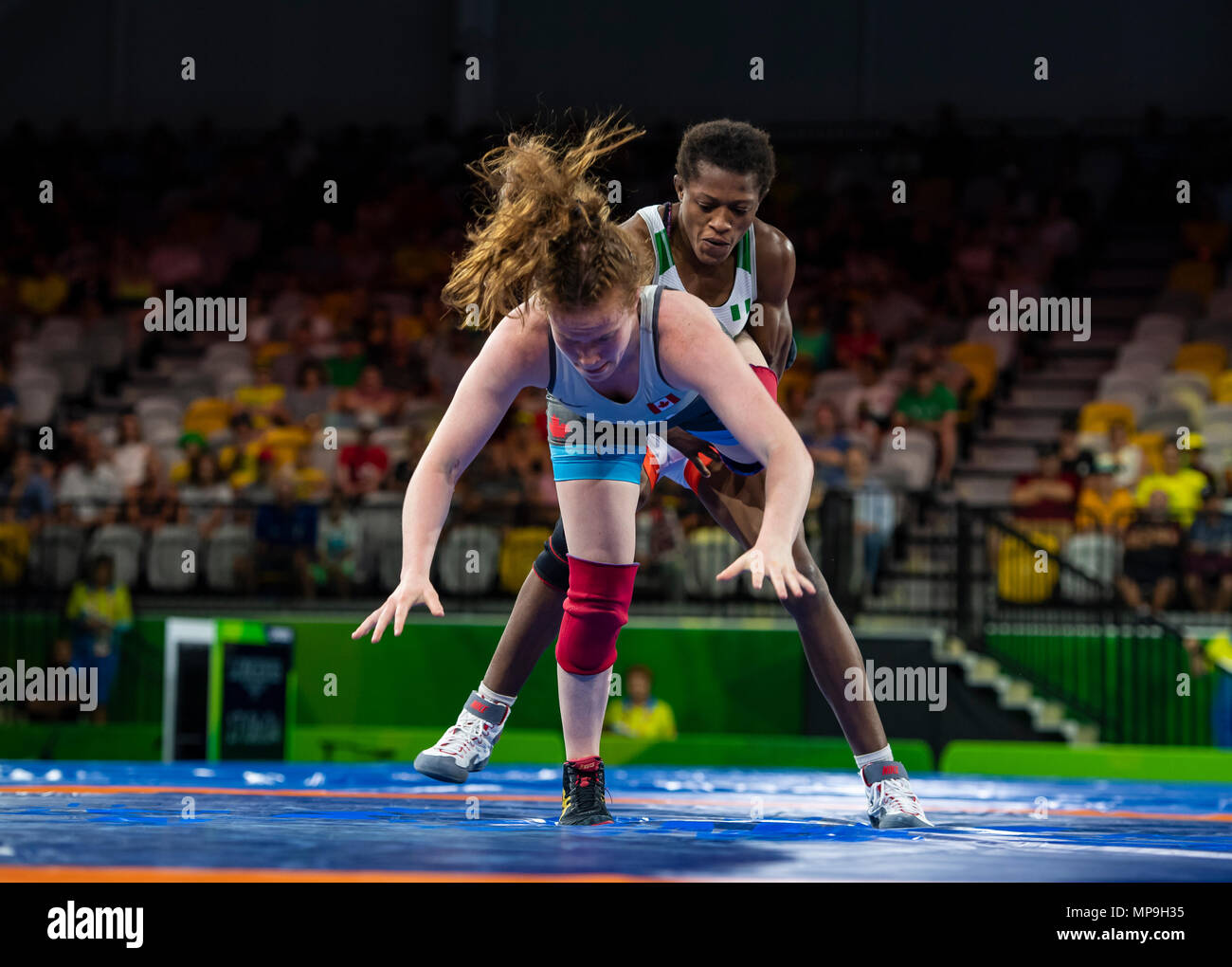 GOLD COAST, AUSTRALIA - APRIL 13: Emily Schaefer of Canada v Odunayo ...