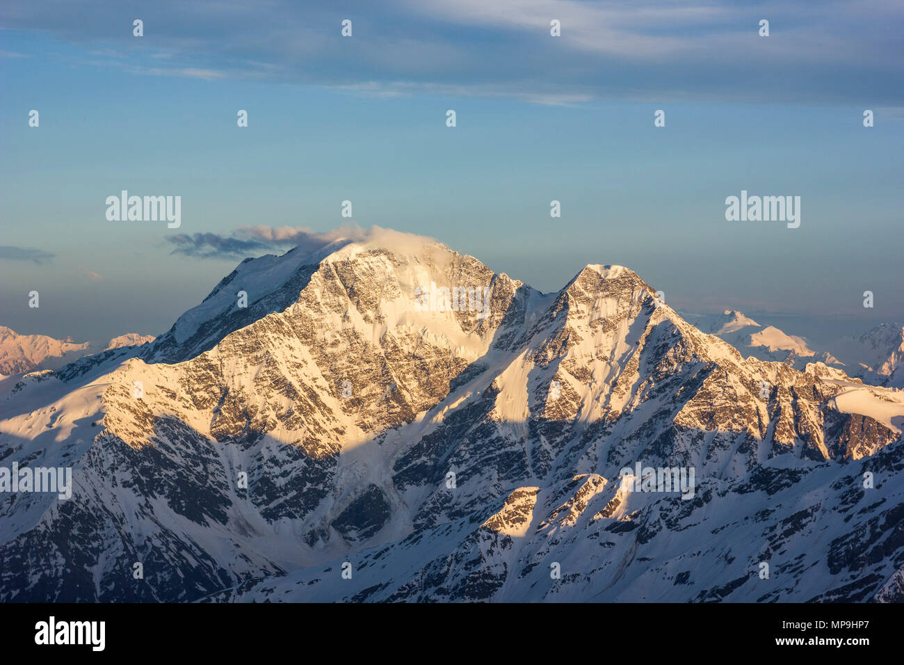 snowy Caucasus mountains at sunset Stock Photo - Alamy