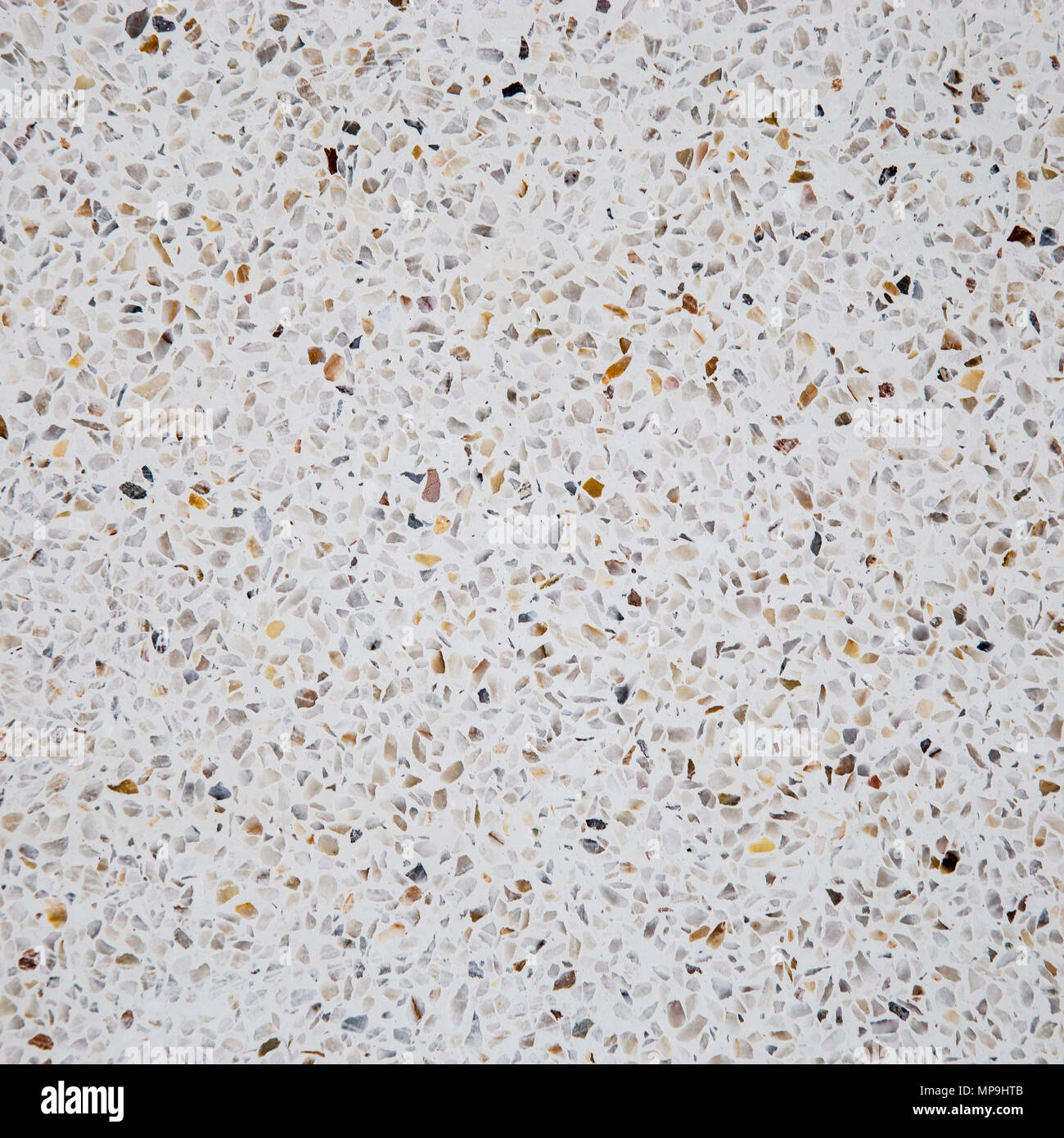 Small stone pebble wall texture for background Stock Photo - Alamy