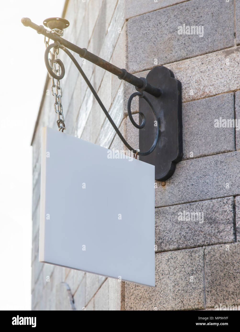 Blank white mock up of shop street sign Stock Photo - Alamy