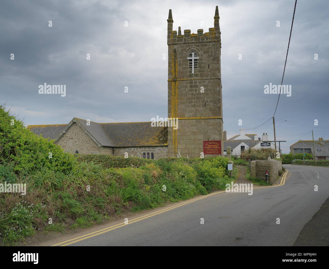 St. Sennen Parish Church viewed from across the A30 with "The First and ...