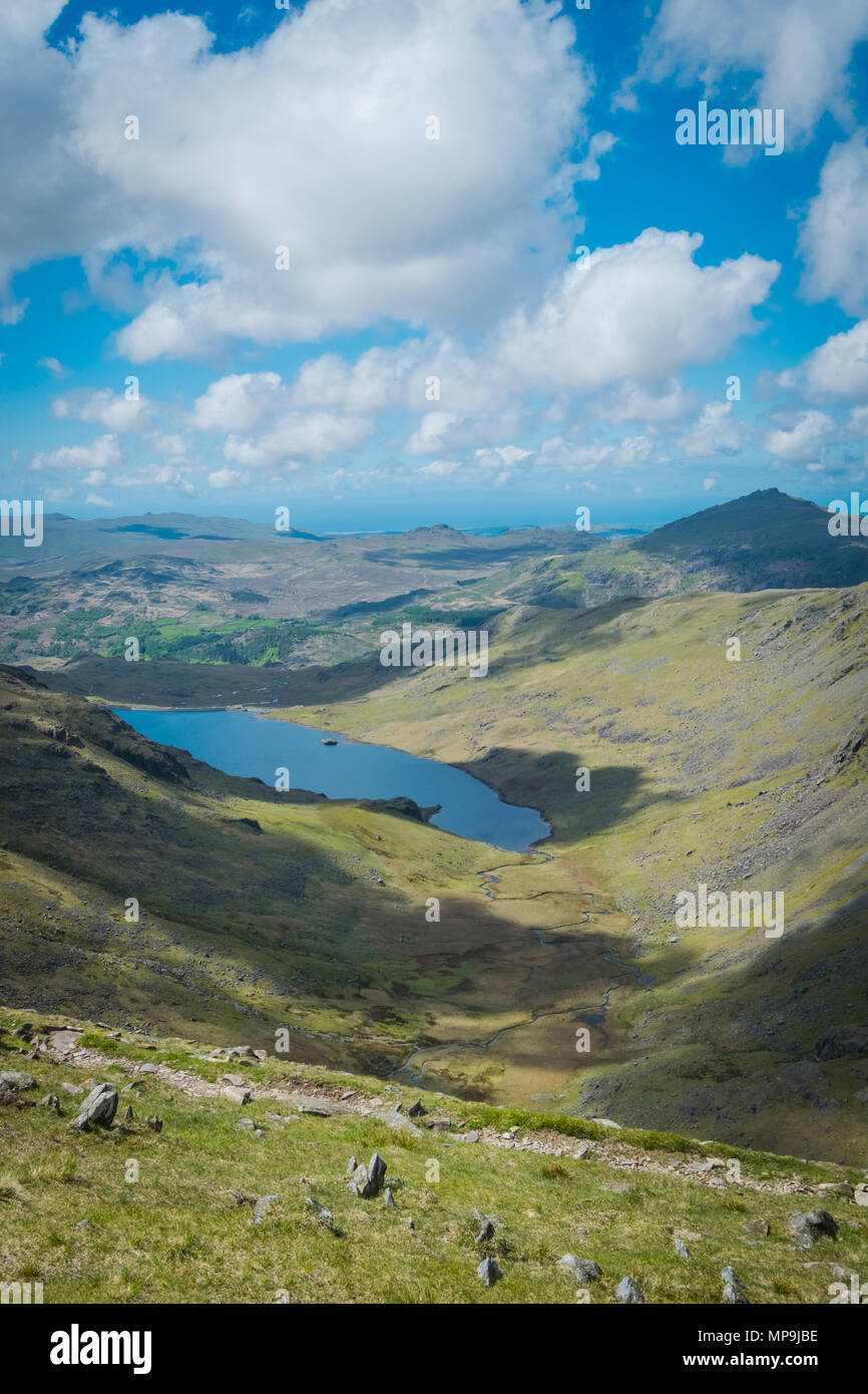 A Tarn is visible as you look out across the Lake District National ...