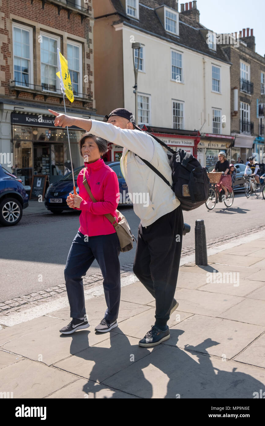Guide holding flag hi-res stock photography and images - Alamy