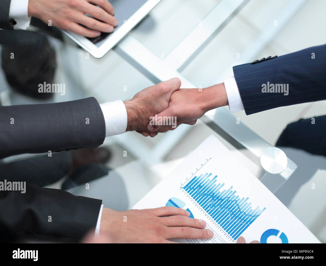 close up. investor and businessman shaking hands Stock Photo - Alamy