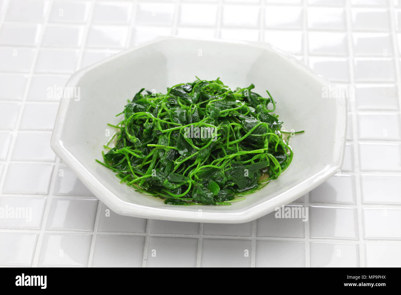chinese white wine stir fried with toothed bur clover, shanghai cuisine ...