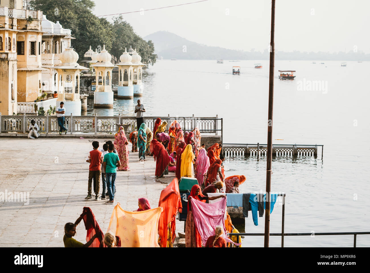 Indian women washing clothes by hand hi-res stock photography and ...