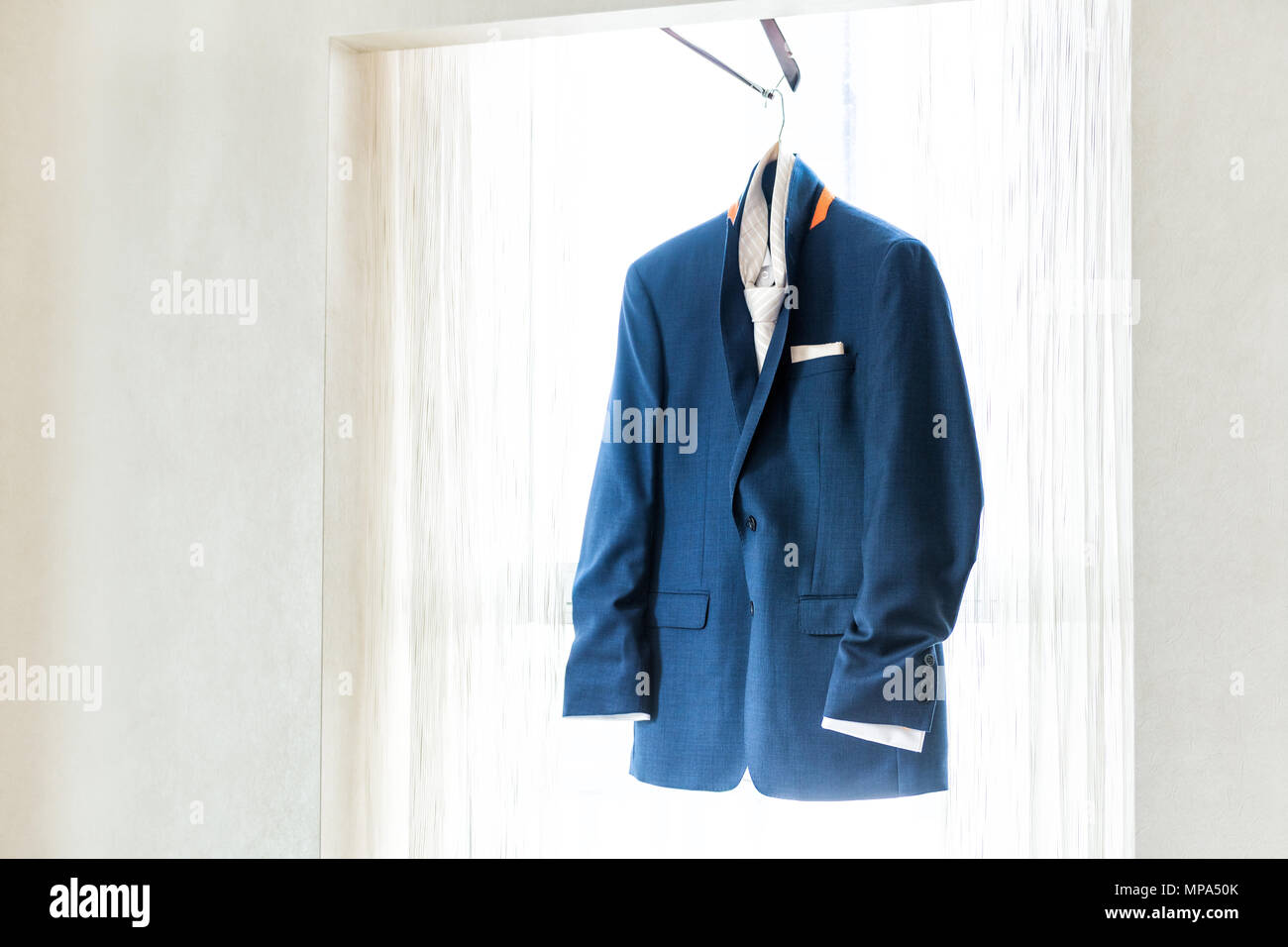 Men's new marine navy blue suit and tie groom closeup wedding ...