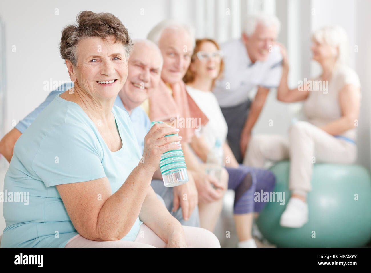 Group of seniors drinking water hi-res stock photography and images - Alamy
