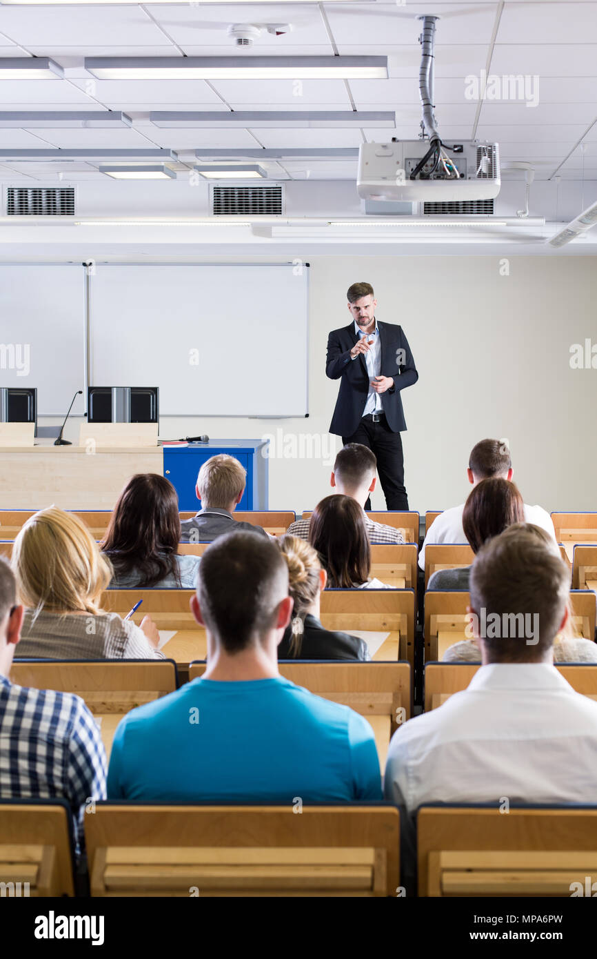 Group of students during university conference Stock Photo - Alamy