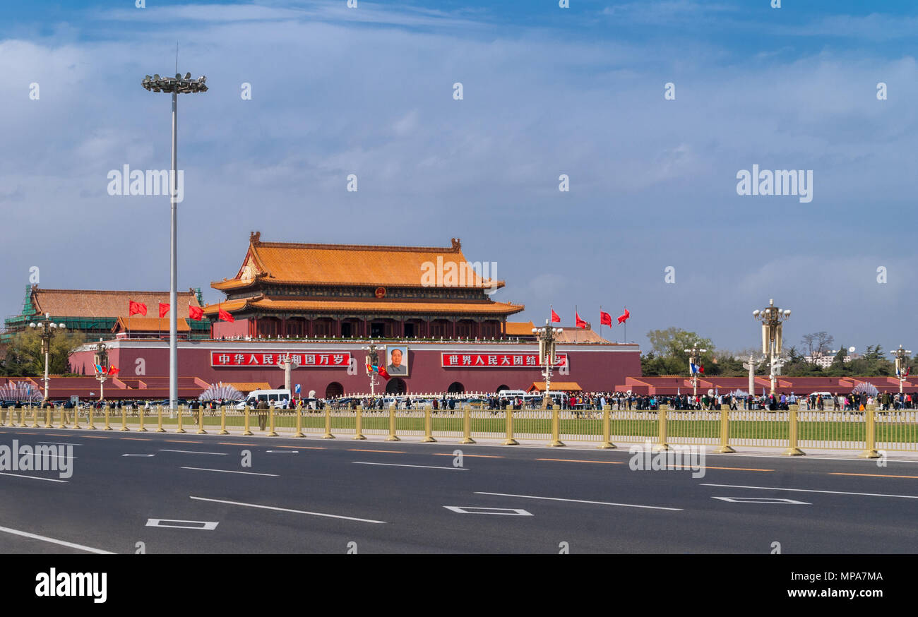 Beijing, China - April 27, 2010: Monumentl red-orange building and tall ...