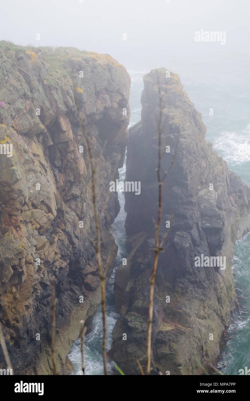 Rugged Coastal Sea Stack under North Sea Fog (Haar). Cove Bay, Aberdeen ...