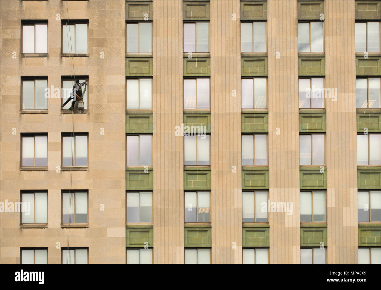 window washer hanging by rope in Madison Wisconsin Stock Photo - Alamy