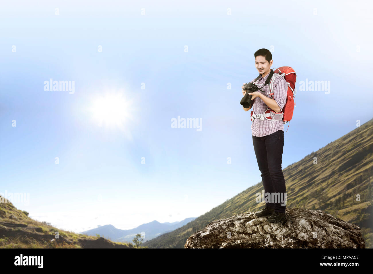 Backpack climb hi-res stock photography and images - Alamy