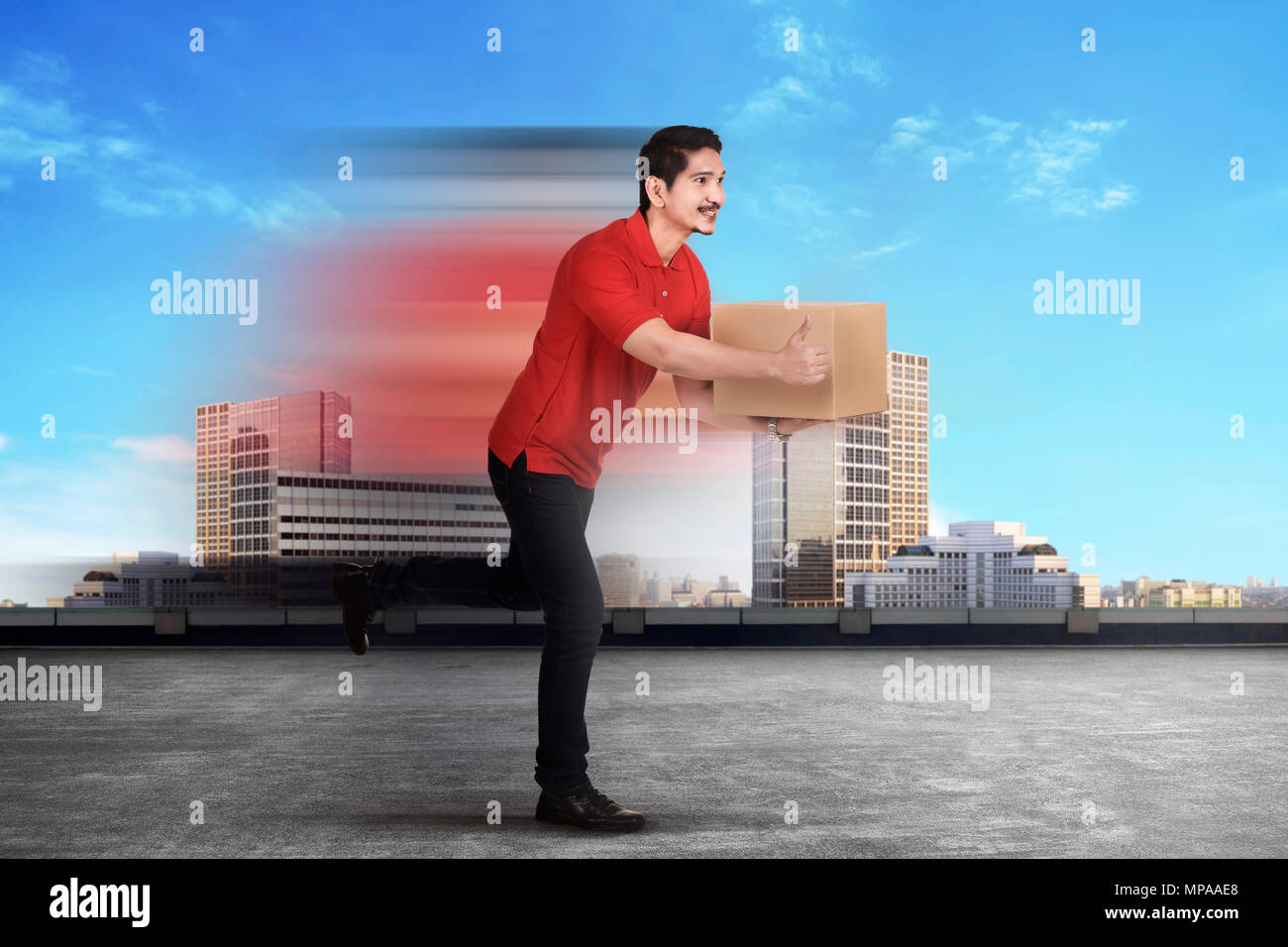 Courier smiling guy with package hi-res stock photography and images ...