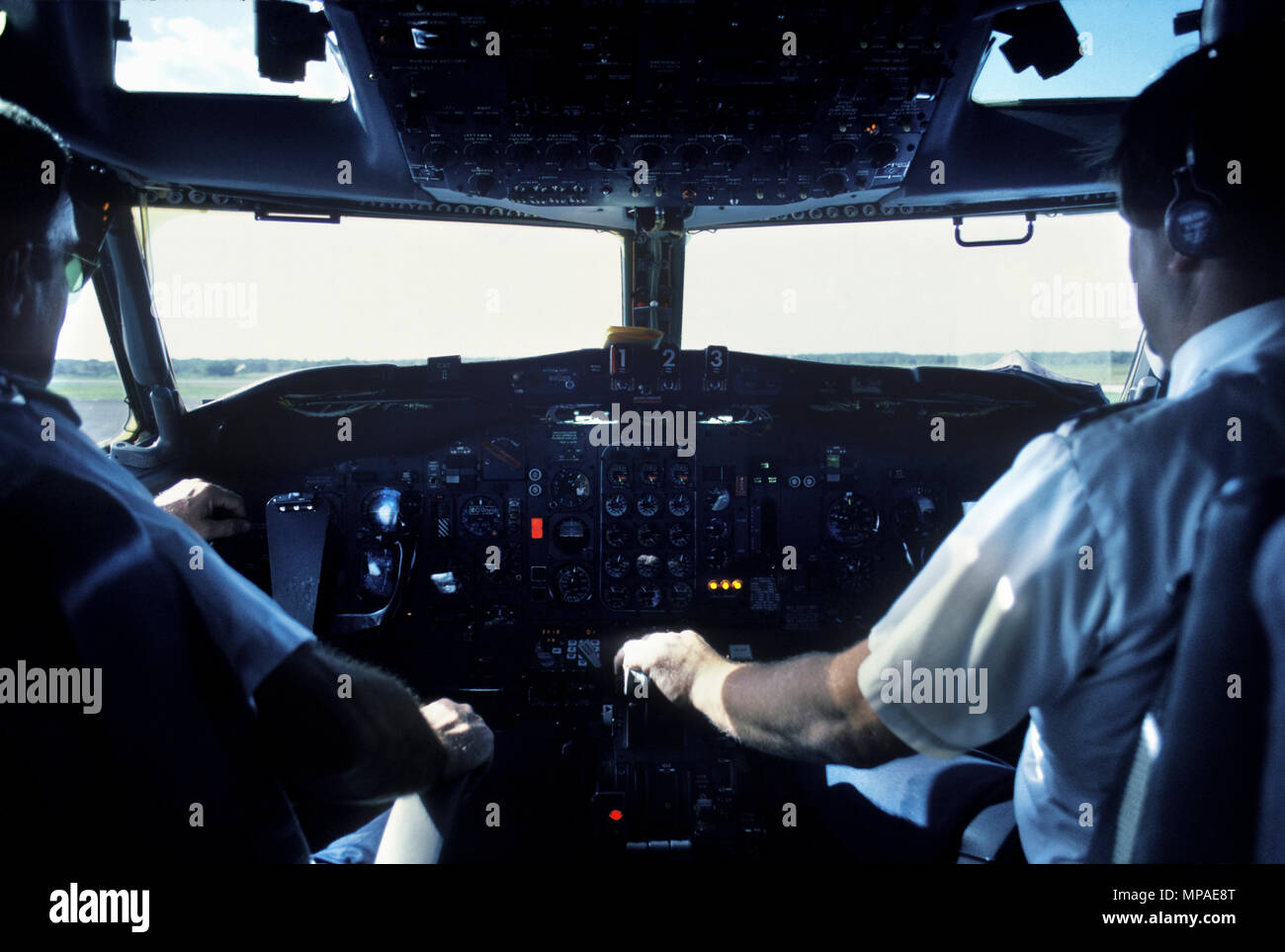 1988 HISTORICAL PILOTS TAKING OFF IN COMMERCIAL JET AIRLINER COCKPIT ...