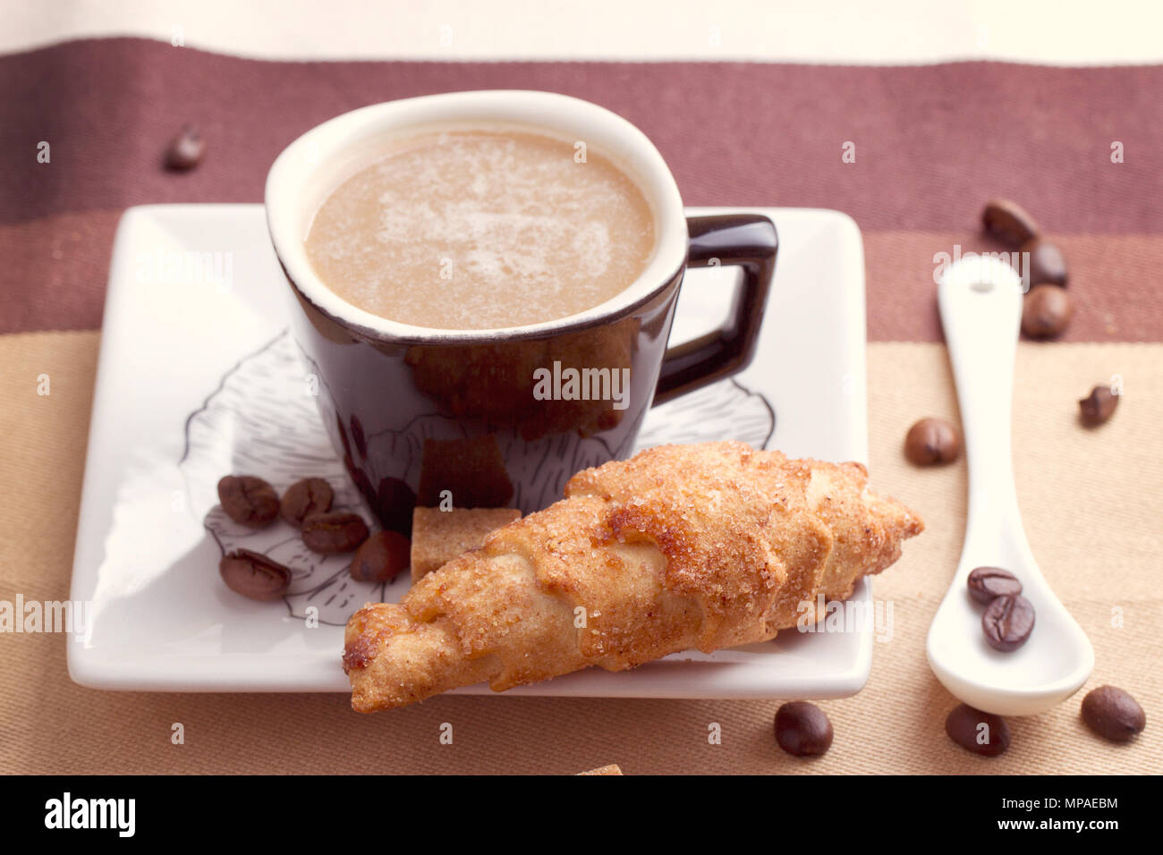 Coffee served with croissant and sfogliatella Stock Photo - Alamy