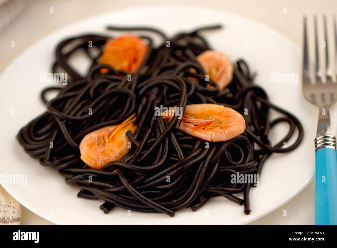 Black spaghetti prawns on hi-res stock photography and images - Alamy