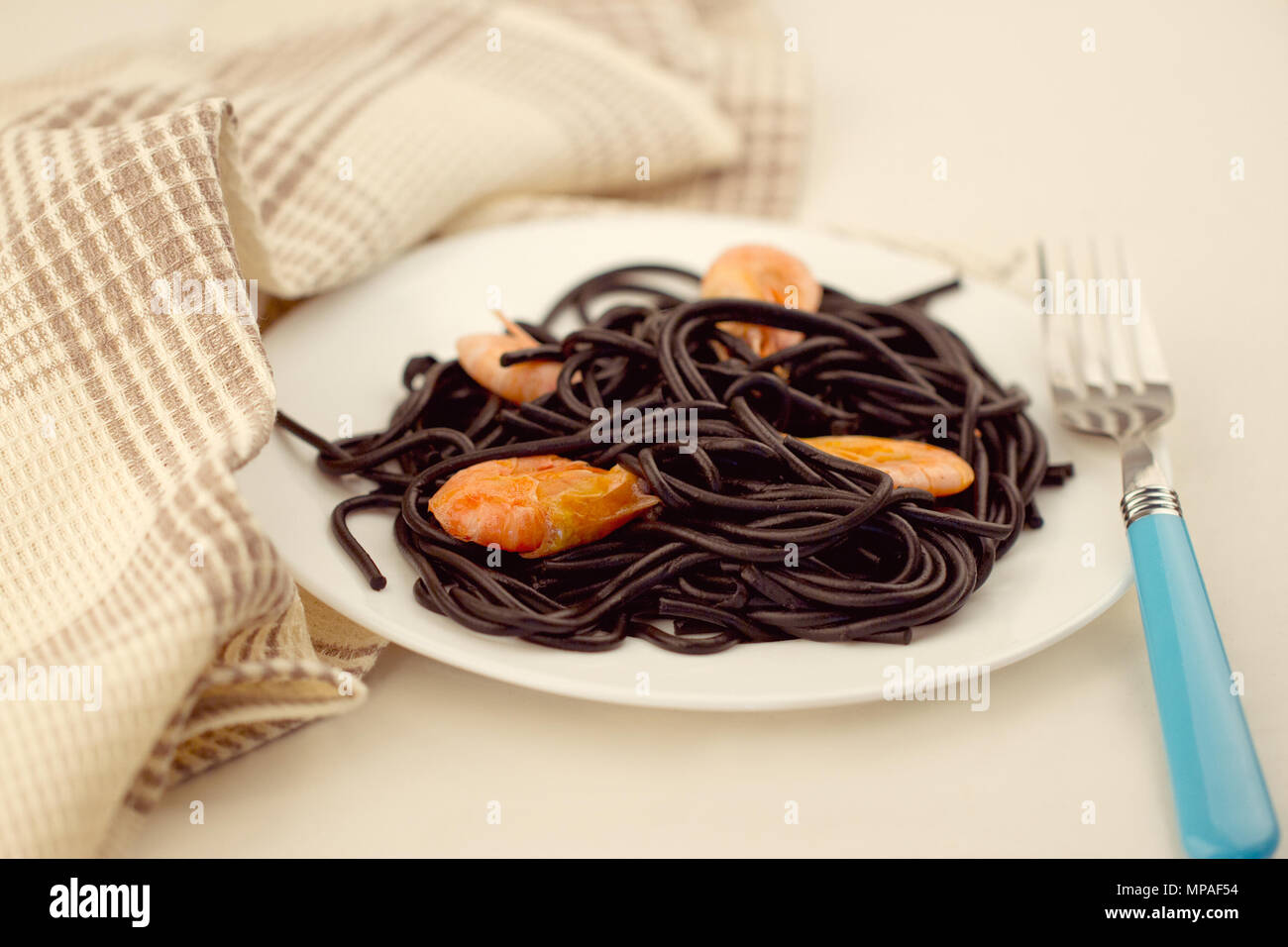 Black spaghetti prawns on hi-res stock photography and images - Alamy