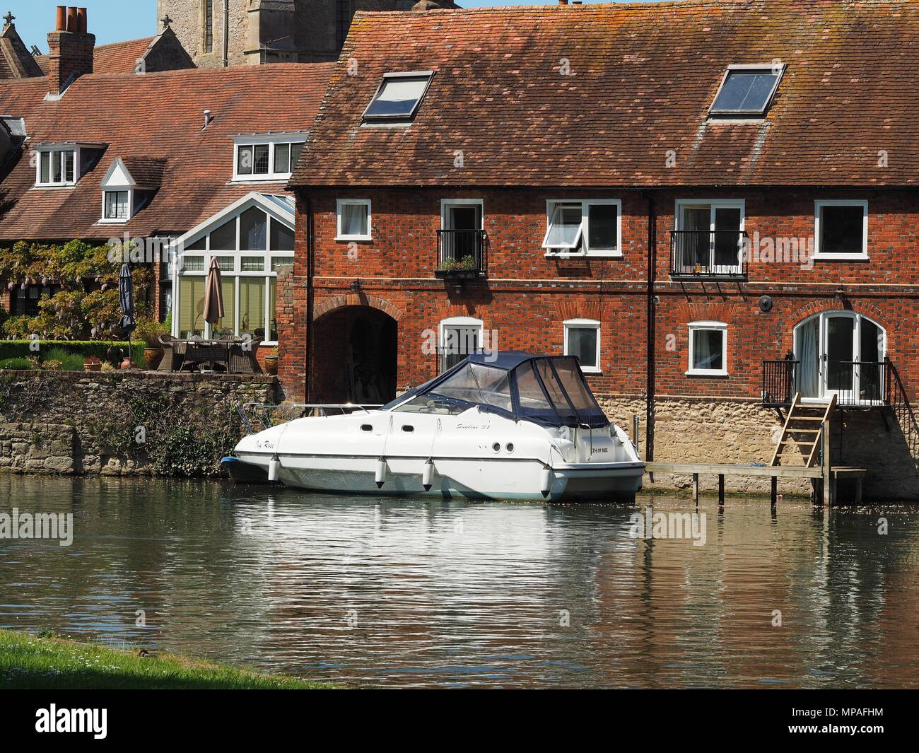 Riverside Property with private boat mooring Stock Photo - Alamy