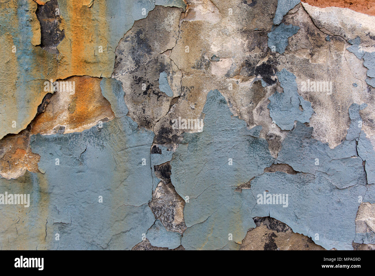 Blue paint peeling plaster gunge wall Stock Photo - Alamy