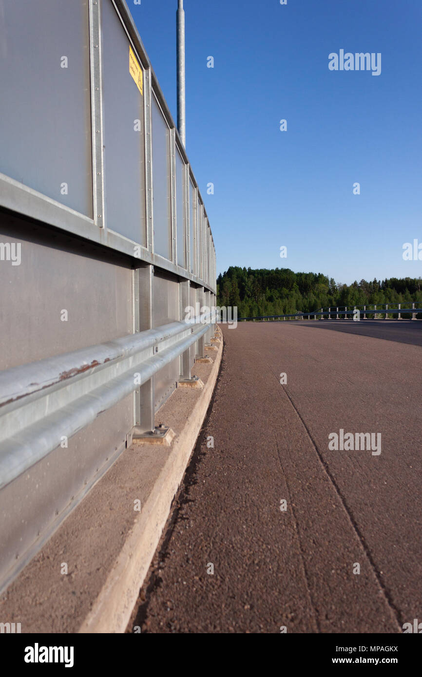 four-way road and bridge that crosses it Stock Photo - Alamy