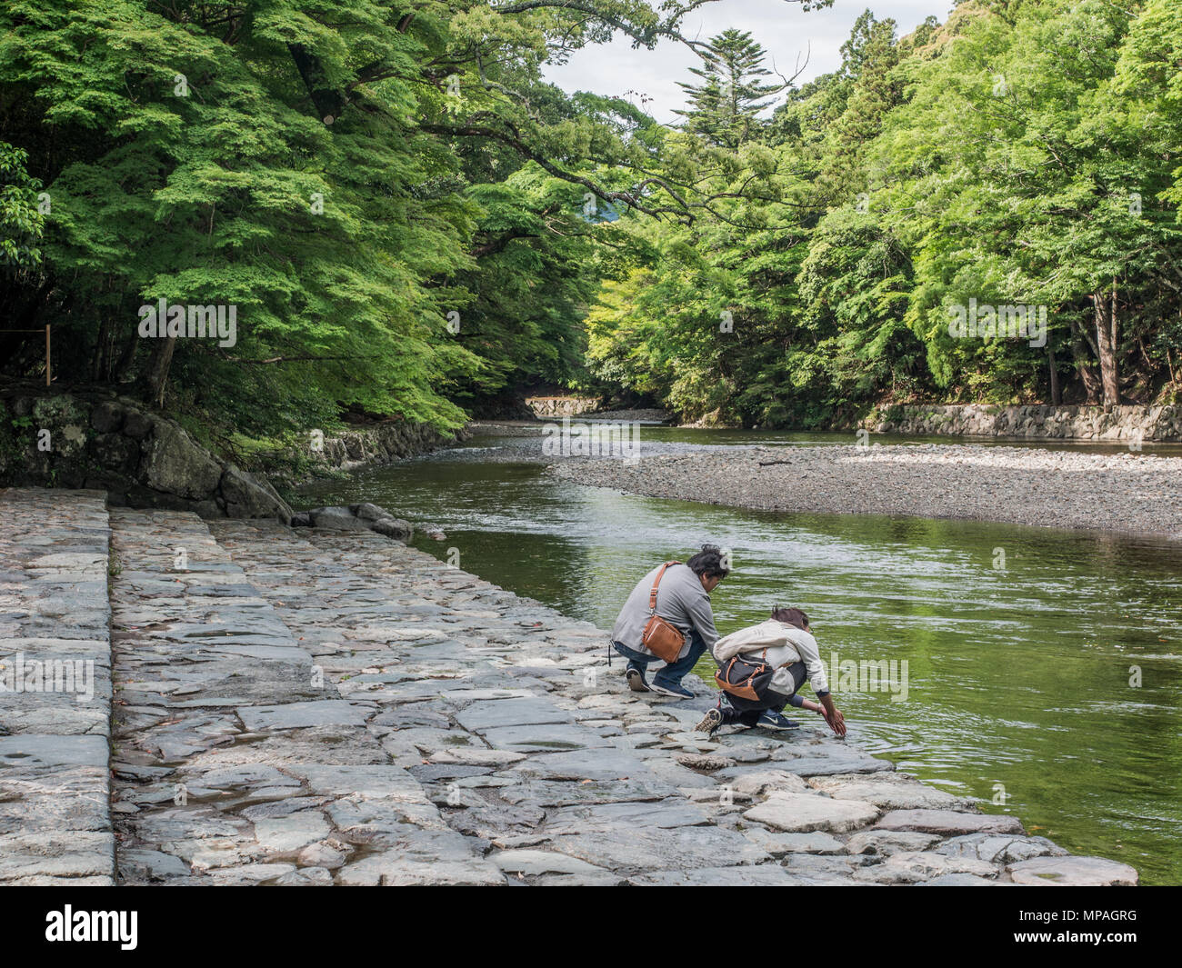 Isuzugawa Mitarashi. Visitors purify themselves with clear water from ...