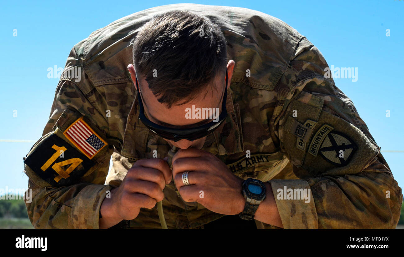 U.S. Army 1st Lt. Noah Currie, a 10th Mountain Division Ranger, takes a ...