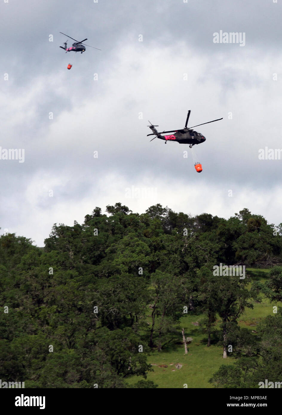 Two UH-60 Black Hawks from the California National Guard carry 600 ...