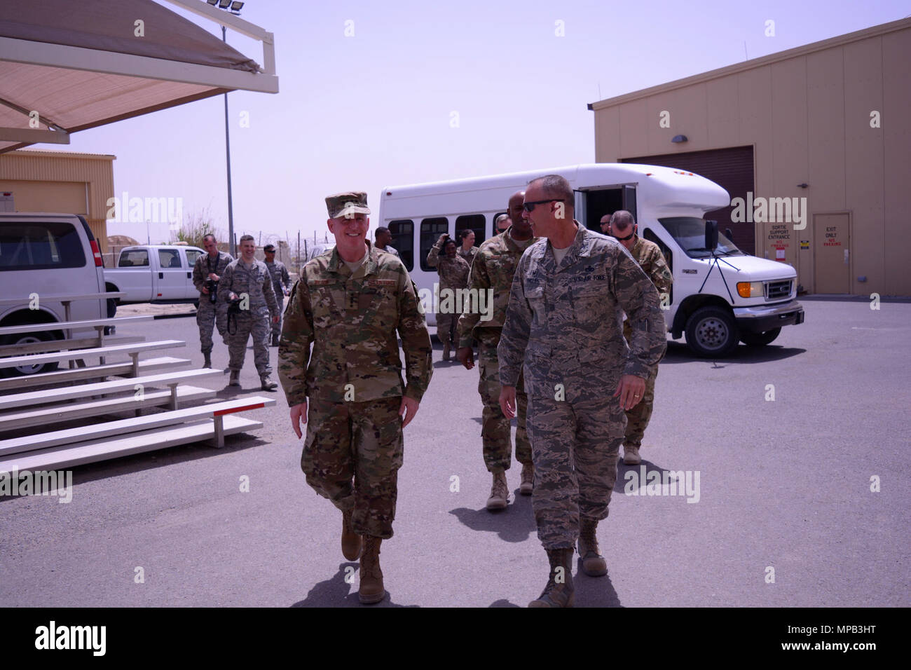 General Stephen W. "Seve" Wilson (left) walks beside Air Force Colonel ...