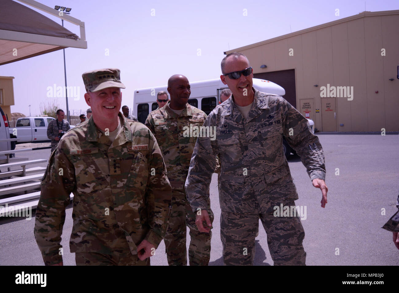 General Stephen W. "Seve" Wilson (left) walks beside Air Force Colonel ...