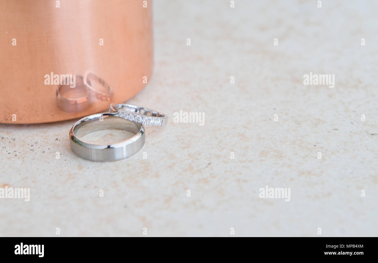 Two gold wedding rings shot hi-res stock photography and images - Alamy