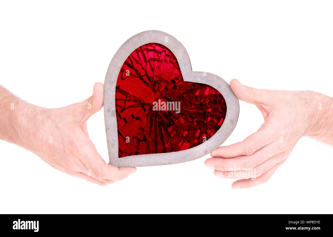 Adult holding heart filled with a large red ruby - Isolated on white ...