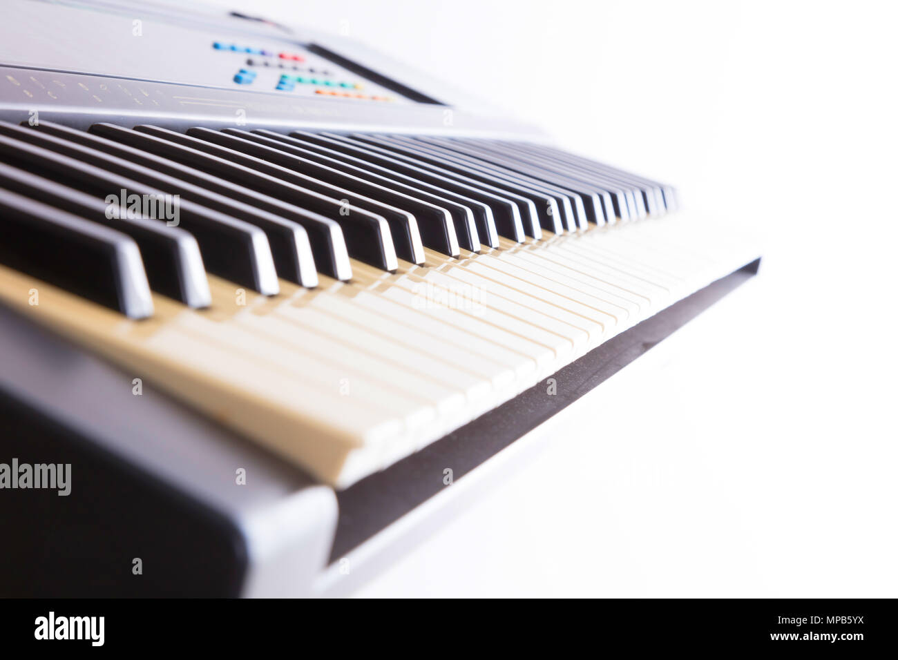 Old keyboard isolated on a white background Stock Photo - Alamy