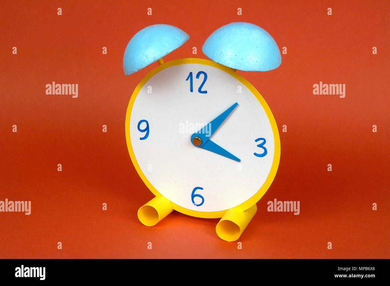 a clock made with paper,origami Stock Photo - Alamy