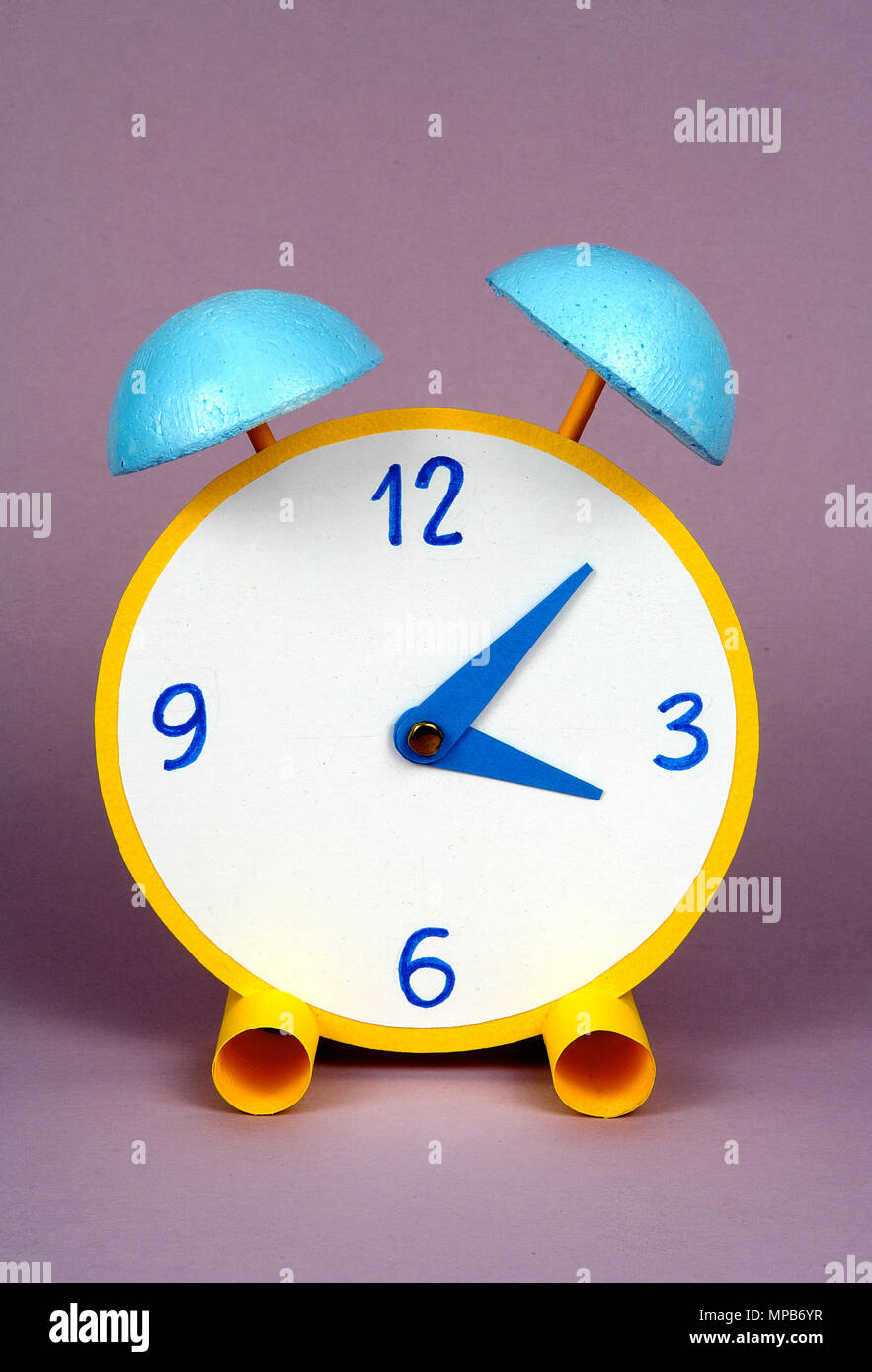 a clock made with paper,origami Stock Photo - Alamy