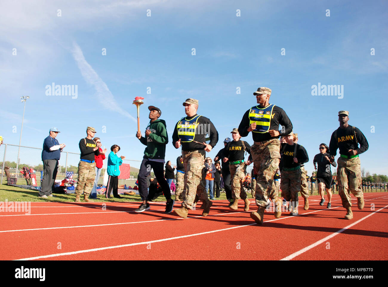 Daniel Conway (left), 14, from Tomlinson Middle School, carries the ...